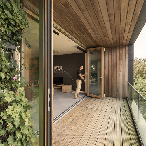 Vetrata scorrevole - COMBILINE - SOLARLUX - a fisarmonica / in legno ...